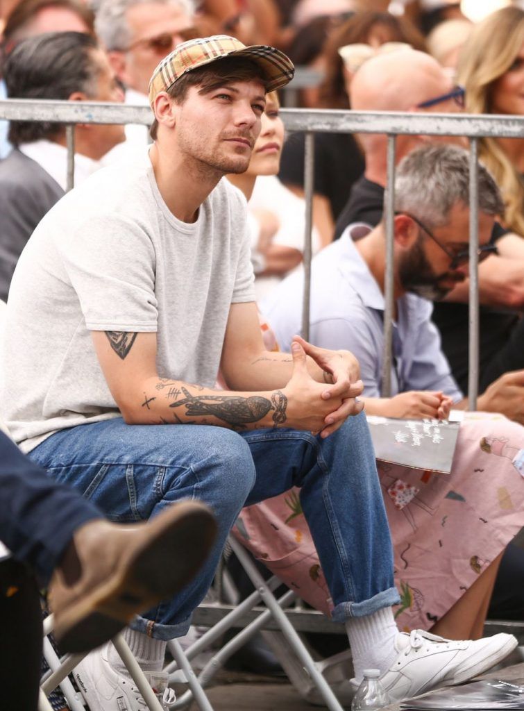 One Direction's Louis Tomlinson 'Marries' Fan While Signing Autographs