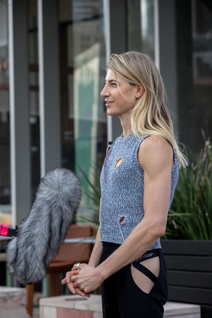 Actor Christian Wilkins Wows on the Red Carpet in Backless Dress