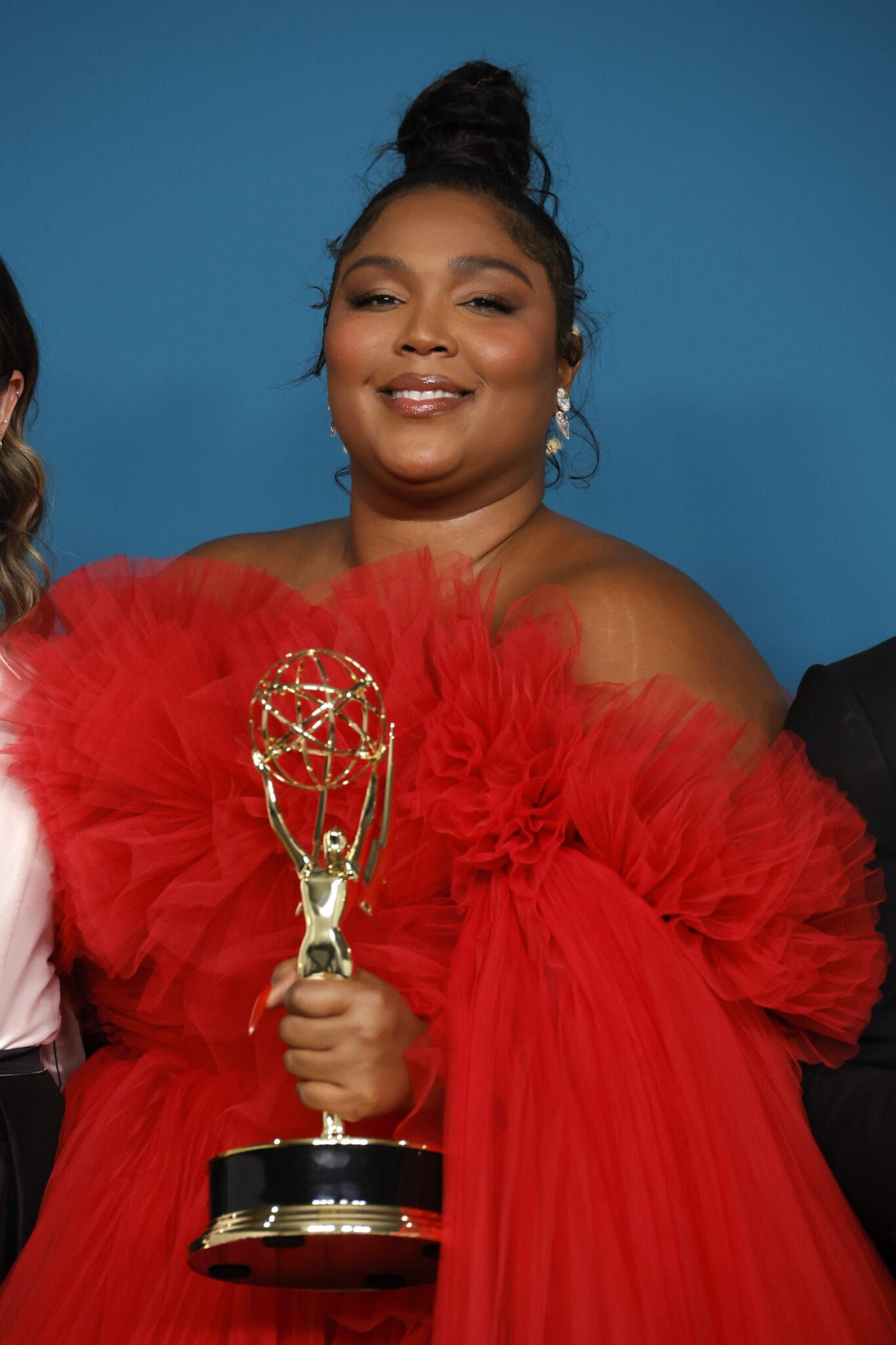Lizzo Recreates Pamela Anderson's Iconic Red Swimsuit Picture Trending ...